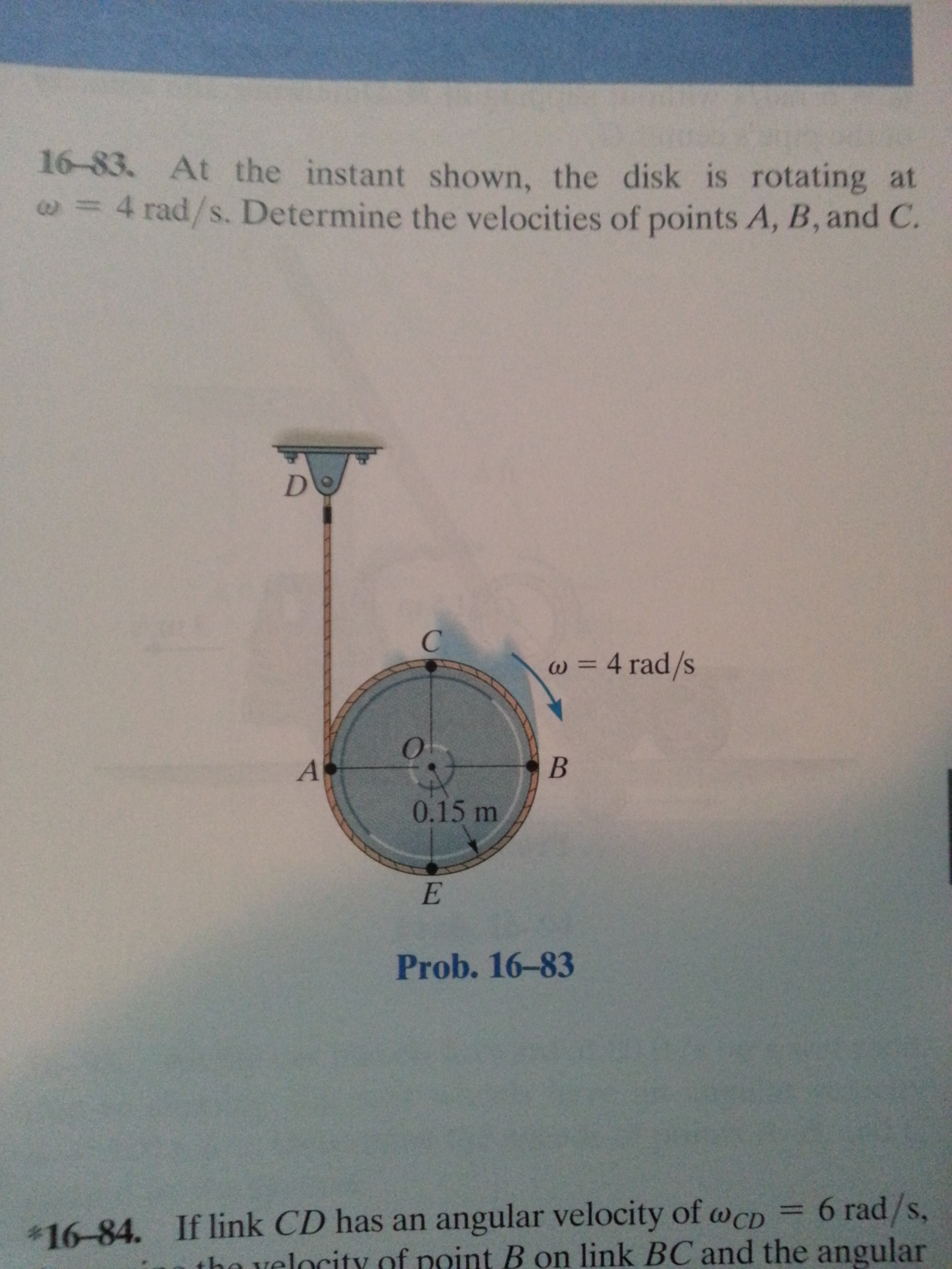 Solved At the instant shown, the disk is rotating at omega = | Chegg.com
