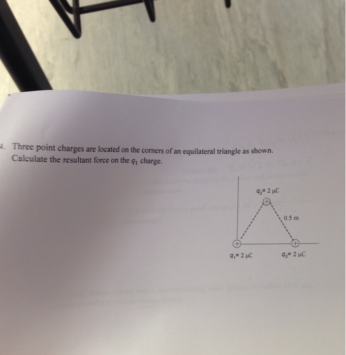 Solved Three point charges are located on the corners of an | Chegg.com