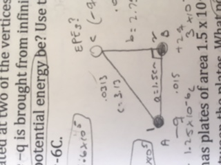Solved Two point charges are located at two of the vertices | Chegg.com