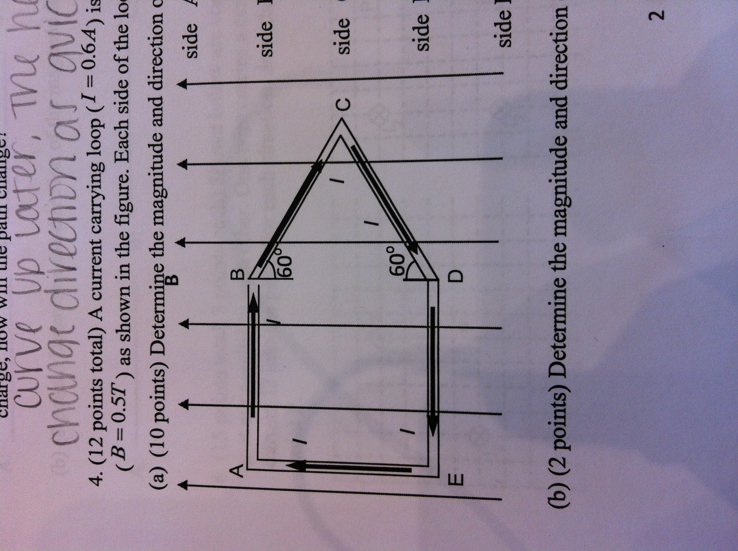 Solved A current carrying loop (I=0.6A) is placed in a | Chegg.com
