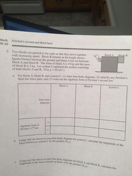 Solved Two blocks are pushed to the right so that they move | Chegg.com
