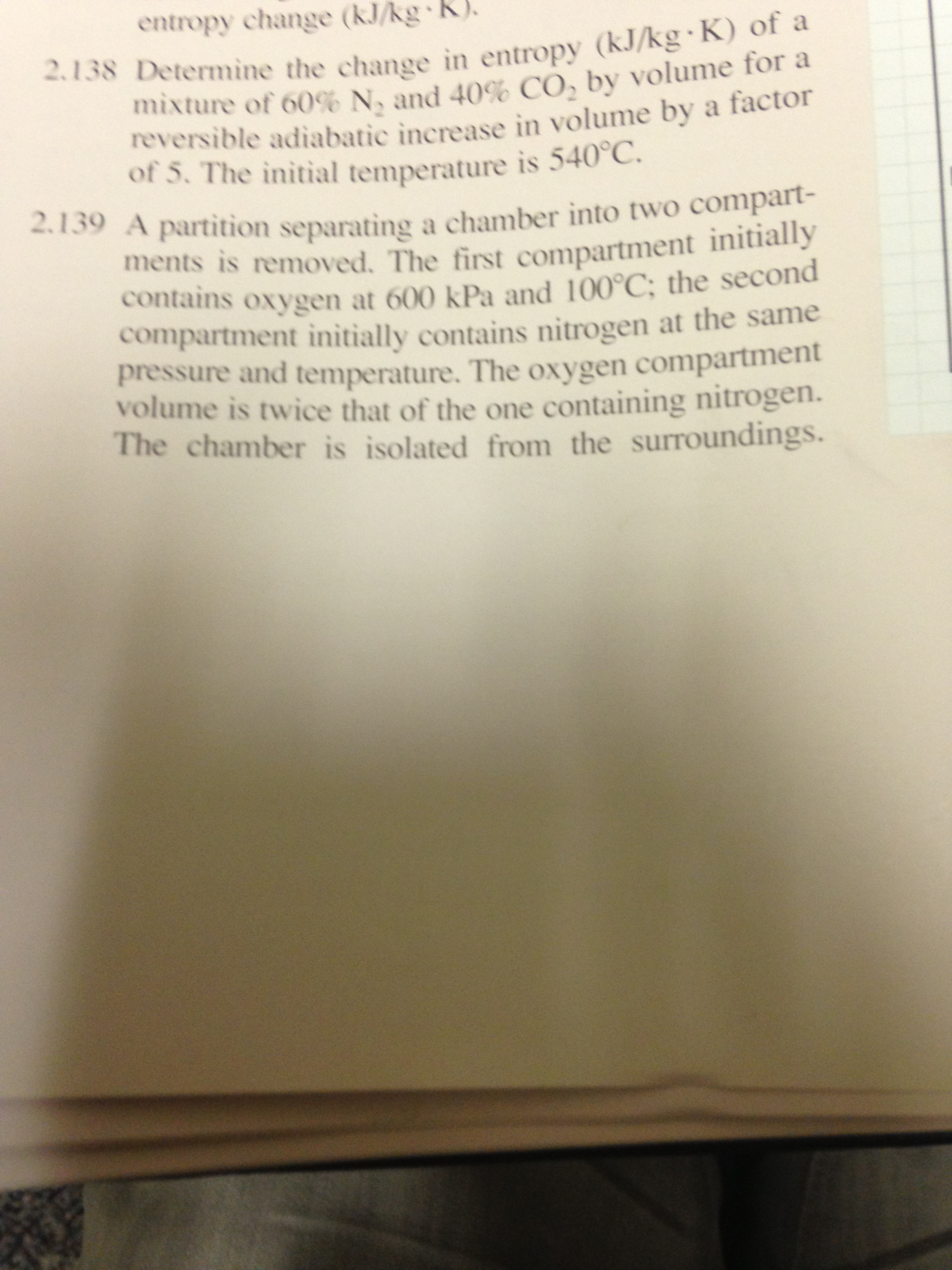 Solved A partition separating a chamber into two | Chegg.com