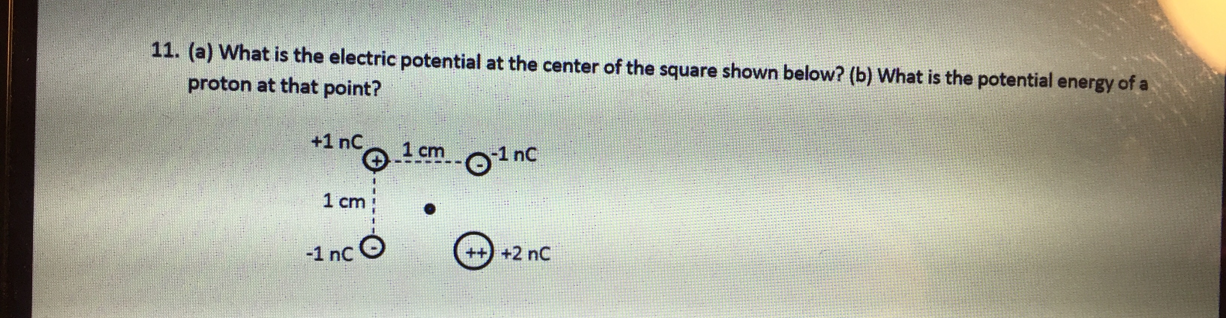 Solved What is the electric potential at the center of the | Chegg.com