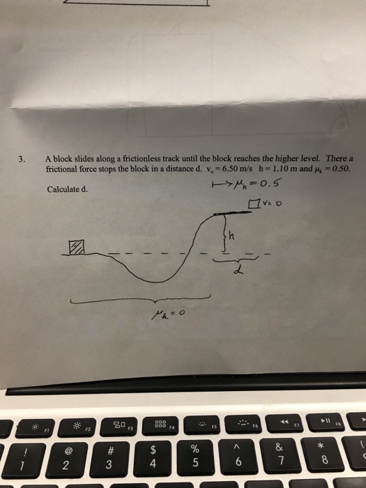 Solved A block slides along a frictionless track until the | Chegg.com