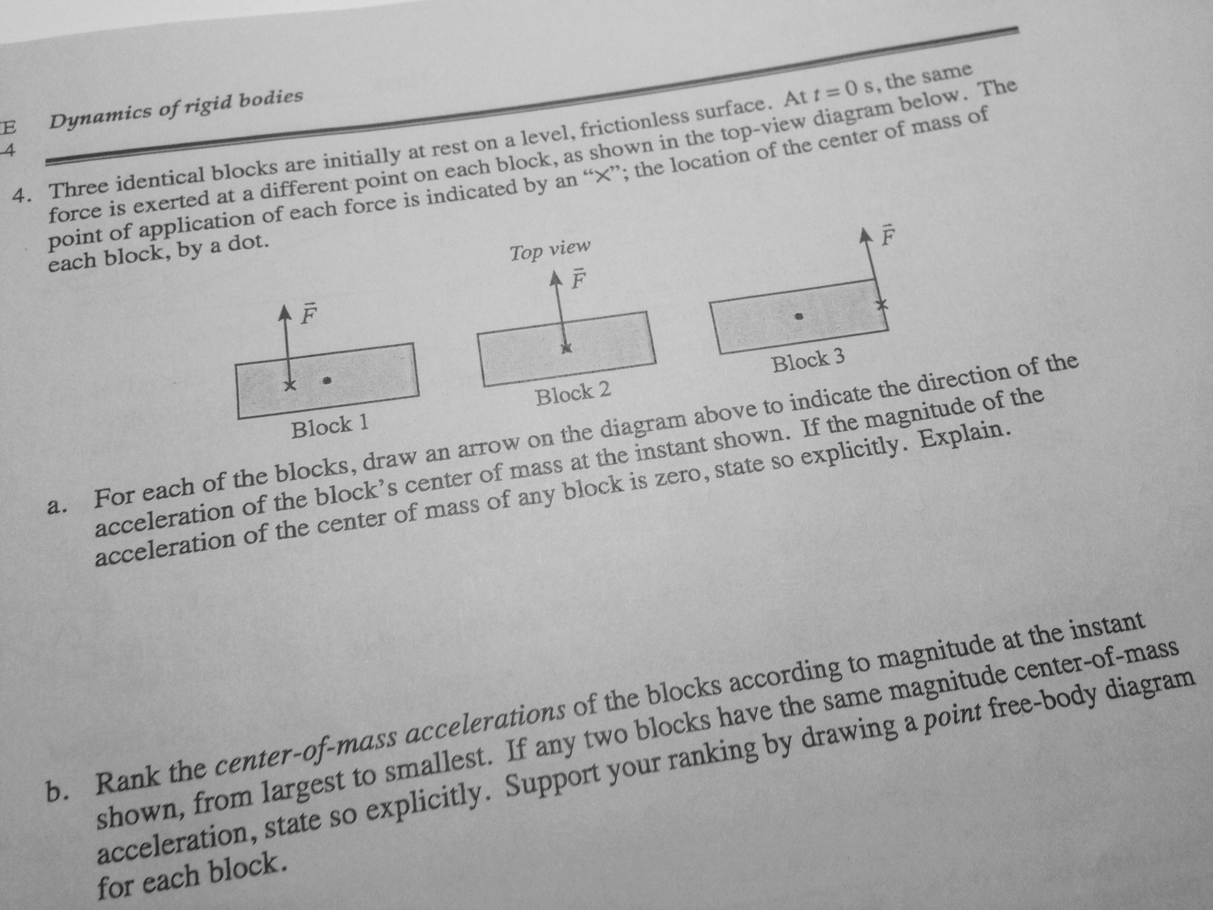 Solved Three identical block are initially at rest on a | Chegg.com