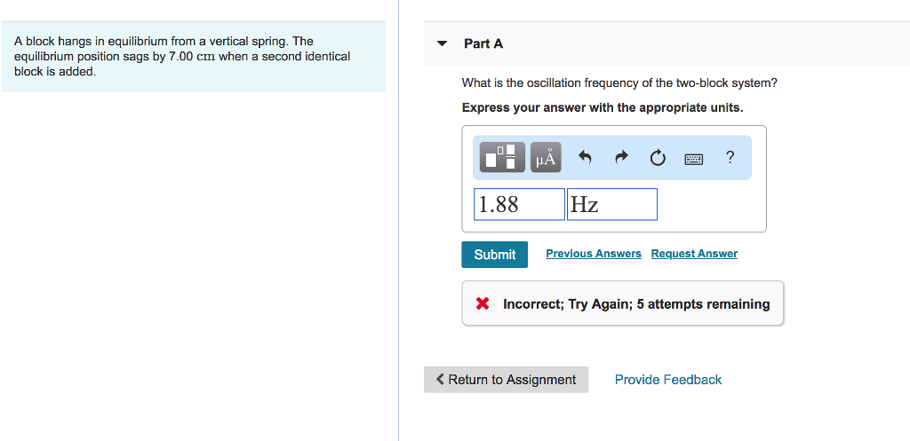 Solved A block hangs in equilibrium from a vertical spring. | Chegg.com