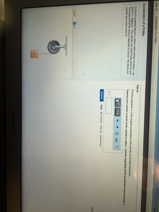 Solved A string is wrapped around a uniform solid cylinder | Chegg.com