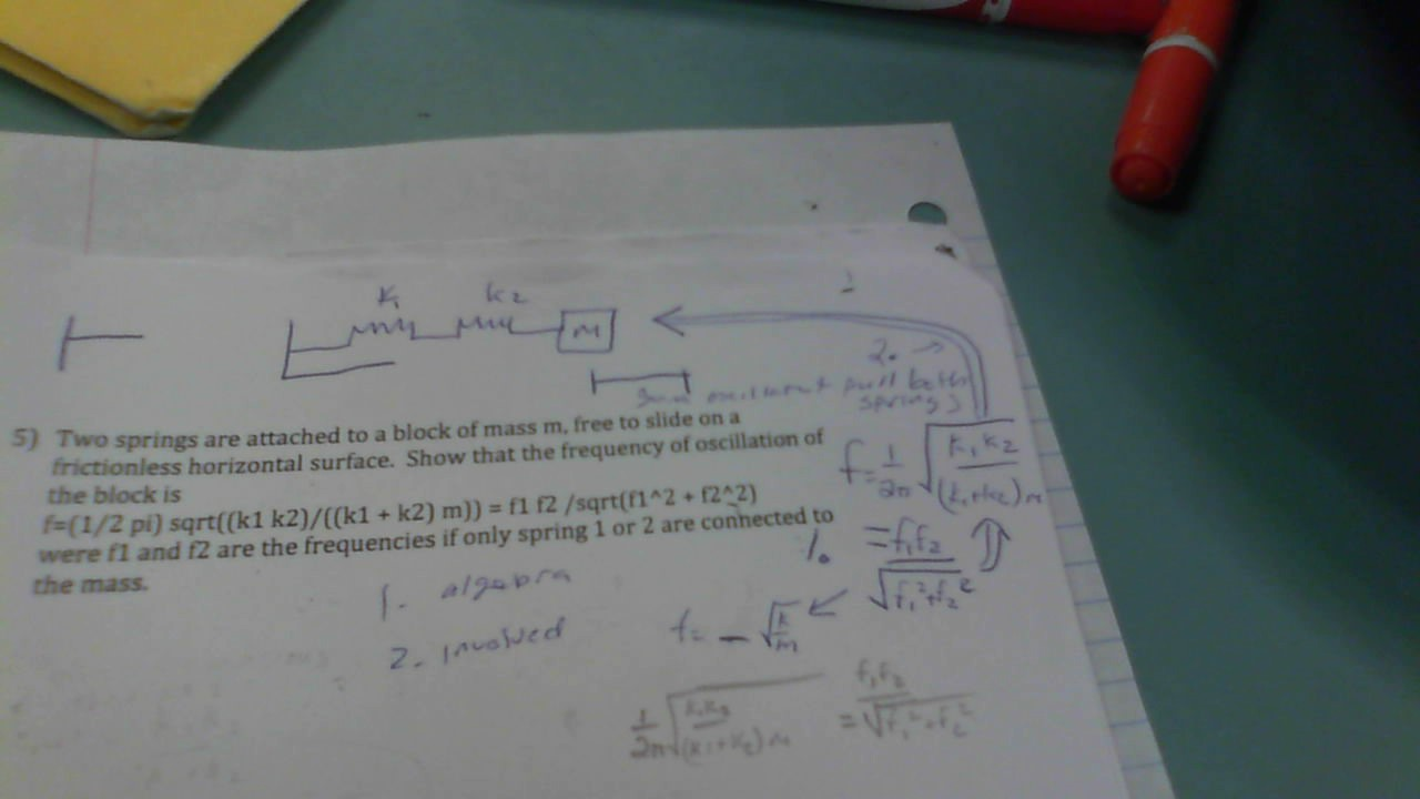 Solved Two springs are attached to a block of mass m, free | Chegg.com