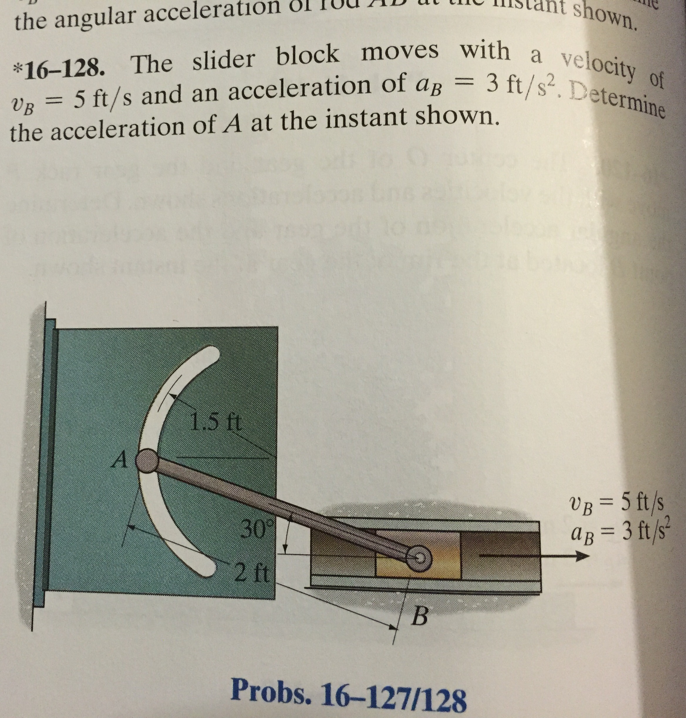 Solved The angular acceleration instant shown. The slider | Chegg.com