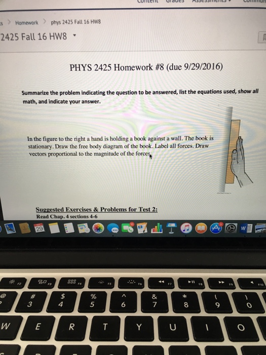 Solved In the figure to the right a hand is holding a book | Chegg.com