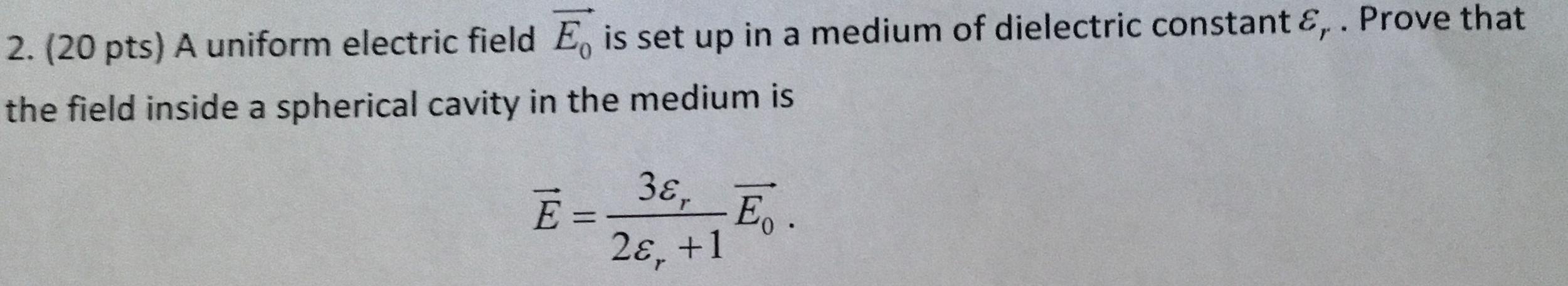 Solved A uniform electric field is set up in a medium of | Chegg.com