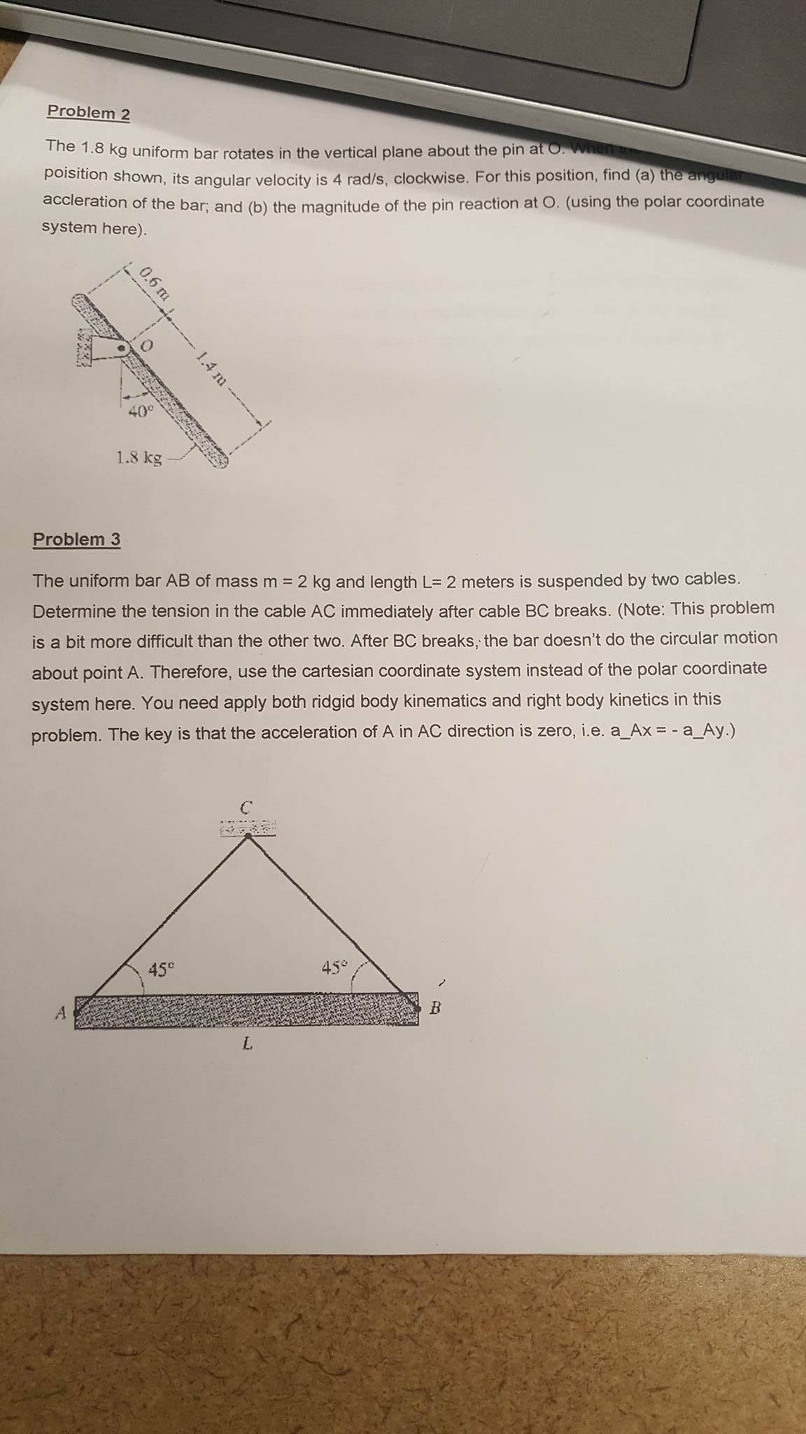 Solved The uniform bar AB of mass m = 2 kg and length L= 2 | Chegg.com
