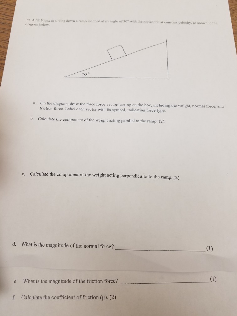 Solved 17. A S2 N box is sliding down a ramp inclined at an | Chegg.com