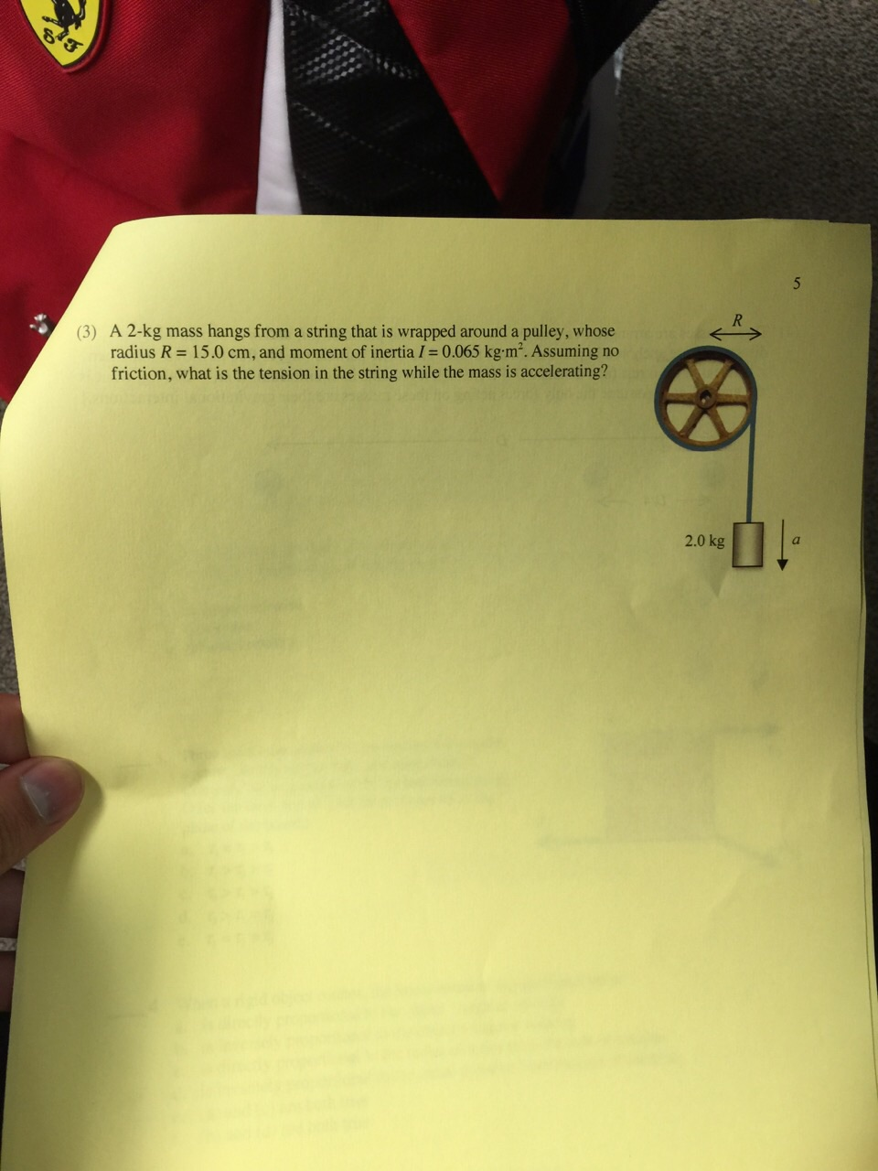 Solved (3) A 2-kg mass hangs from a string that is wrapped | Chegg.com