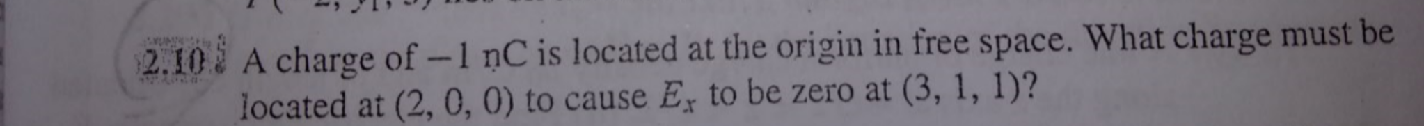 Solved A charge of -1 nC is located at the origin in free | Chegg.com