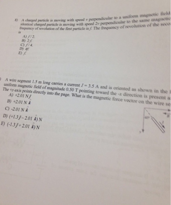 Solved A charged particle is moving with speed v | Chegg.com