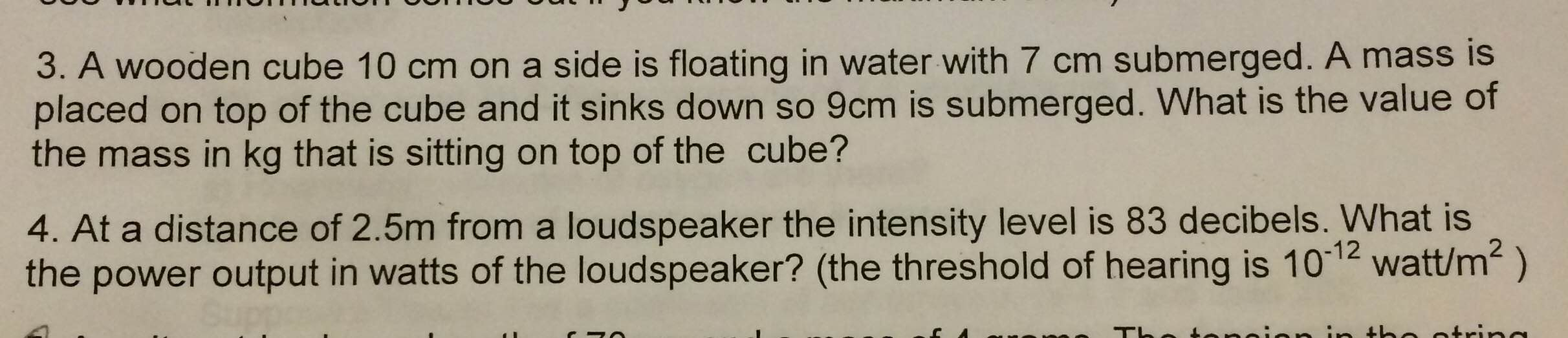 Solved A wooden cube 10 cm on a side is floating in water | Chegg.com