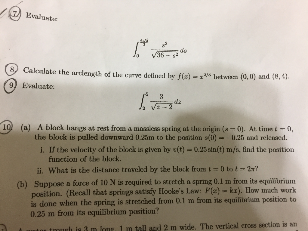 Solved 10- A block hangs at rest from a massless spring at | Chegg.com