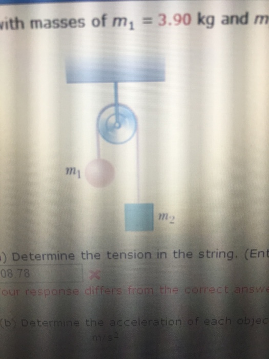 Solved Two objects with masses of m1=3.9kg and m2=7.2kg are | Chegg.com