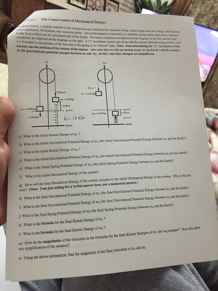 Solved As shown below, a system consists of two masses that | Chegg.com
