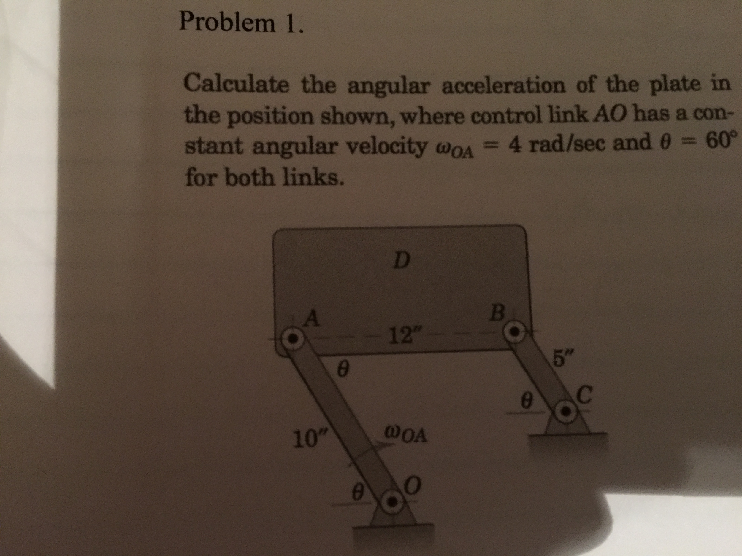 Solved Calculate the angular acceleration of the plate in | Chegg.com