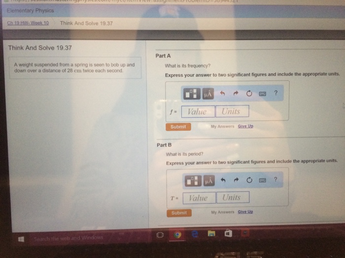 Solved A weight suspended from a spring is seen to bob up | Chegg.com