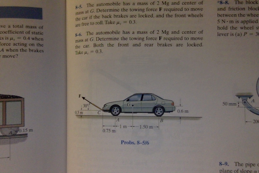 The automobile has a mass of 2 Mg and center of mass | Chegg.com