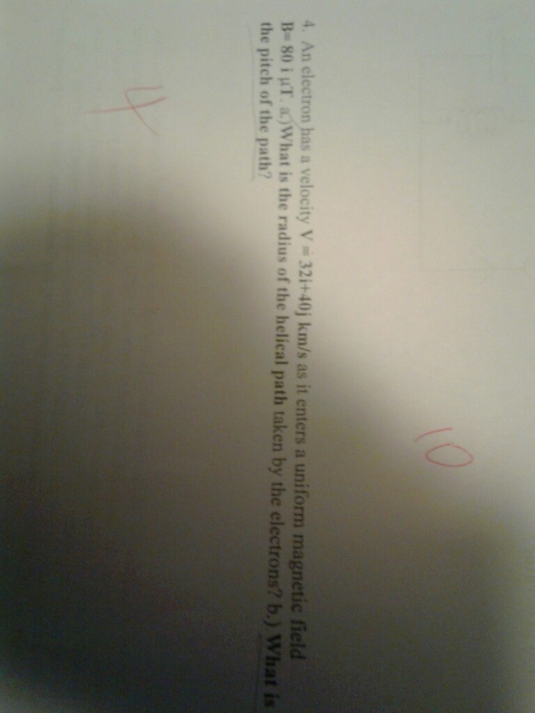 Solved electron has a velocity V 32i-40j km/s as it enters a | Chegg.com