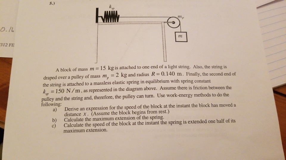 Solved 312 FE A block of mass m 15 kg is attached to one end | Chegg.com