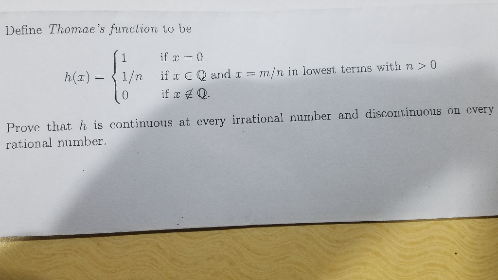 Solved Define Thomae's function to be if 0 h (z) 1/n if x E | Chegg.com