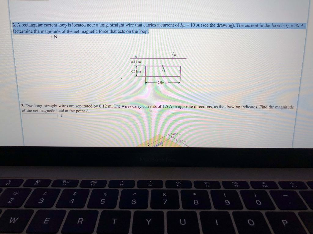 Solved 30 A. 2. A rectangular current loop is located near a | Chegg.com
