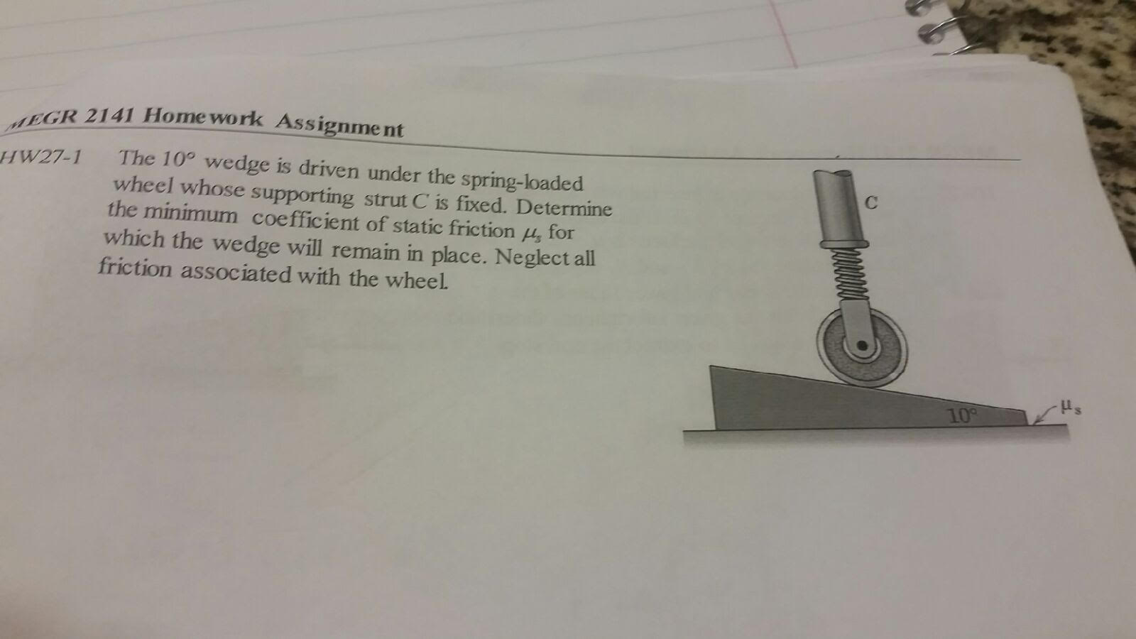 Solved The 10 degree wedge is driven under the spring-loaded | Chegg.com