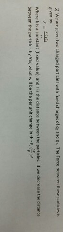 Solved We're given two charged particles with fixed charges | Chegg.com