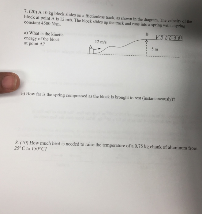 Solved A 10 kg block slides on a frictionless track, as | Chegg.com