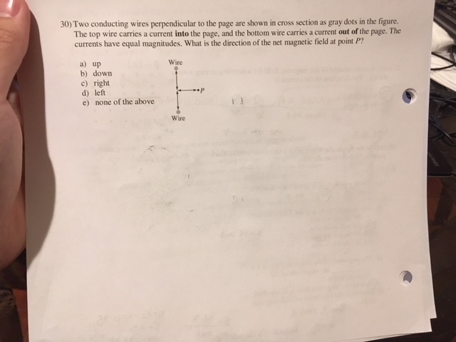 Solved 30) Two conducting wires perpendicular to the page | Chegg.com