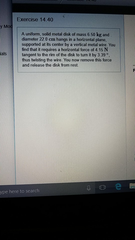 Solved Exercise 14.40 A uniform, solid metal disk of mass | Chegg.com