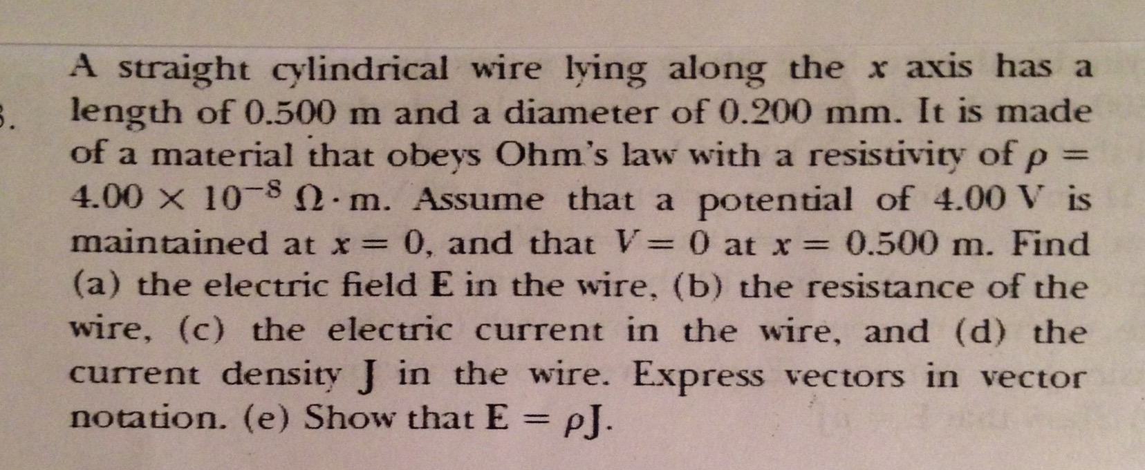 Solved A straight cylindrical wire lying along the x axis | Chegg.com