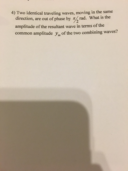 Solved Two identical traveling waves, moving in the same | Chegg.com