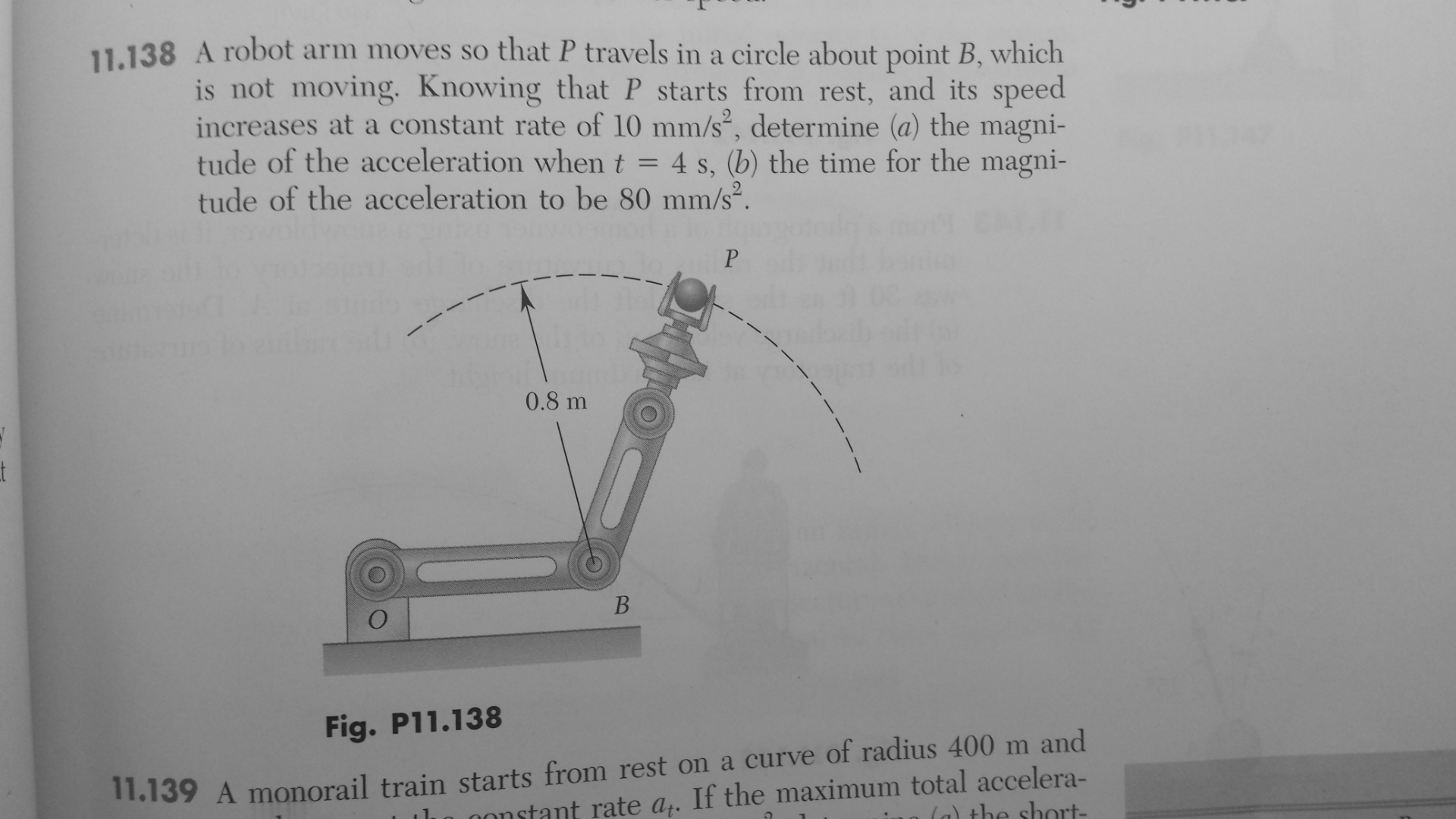 Solved A robot arm moves so that P travels in a circle about | Chegg.com
