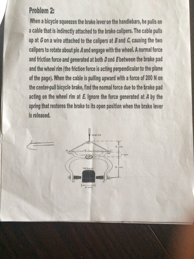 Solved Problem 2: When a bicycle squeezes the brake | Chegg.com