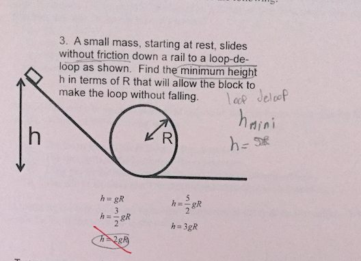 Solved A small mass, starting at rest, slides without | Chegg.com
