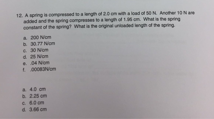 Solved A spring is compressed to a length of 2.0 cm with a | Chegg.com