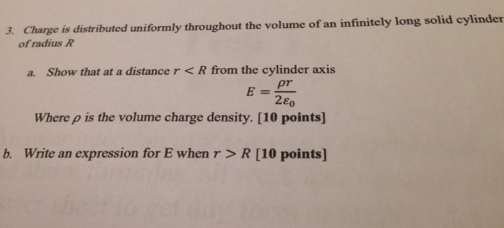 Solved Charge is distributed uniformly throughout the volume | Chegg.com