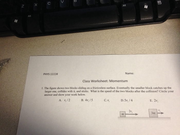 Solved 1. The figure two block sliding on a frictionless | Chegg.com