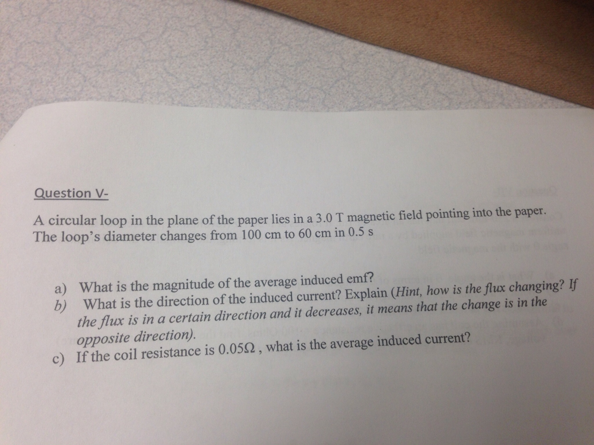 Solved A circular loop in the plane of the paper lies in a | Chegg.com