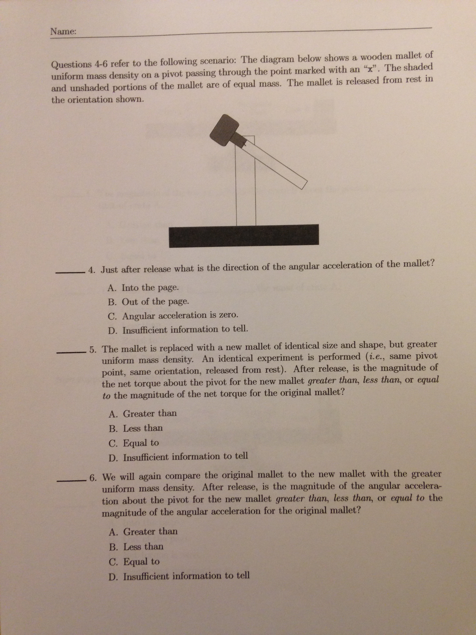 Solved The diagram below shows a wooden mallet of uniform | Chegg.com
