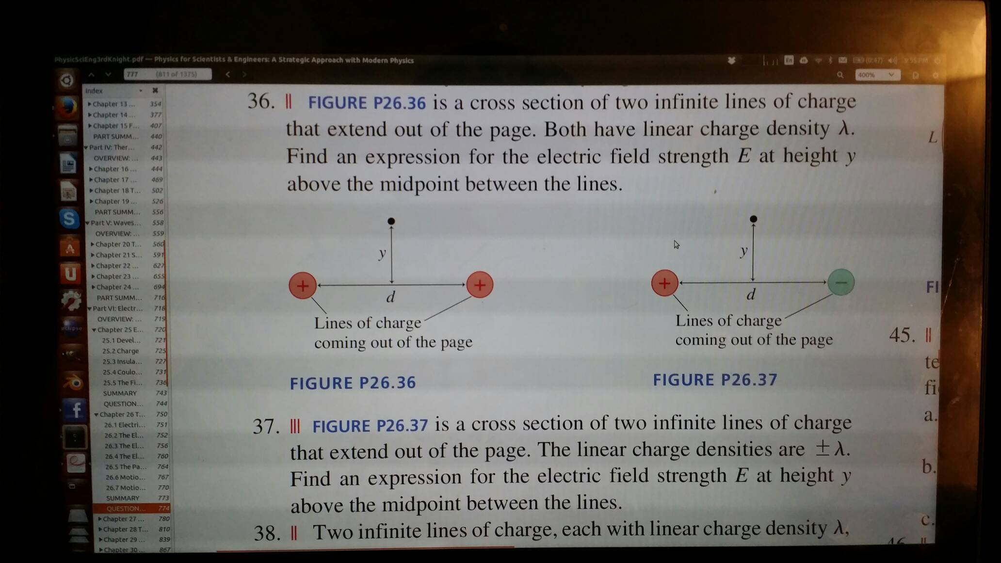 Figure P26.36 is a cross section of two infinite | Chegg.com