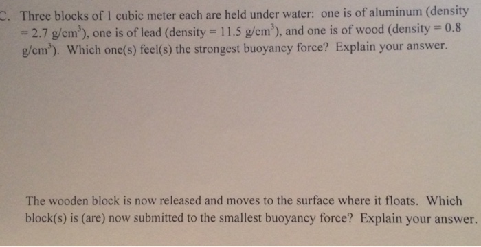 Solved Three blocks of 1 cubic meter each are held under | Chegg.com